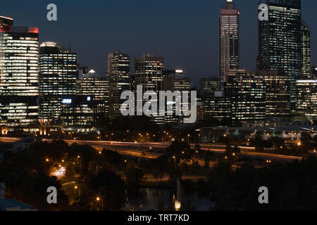 Wide shot of Perth's skyline at night with Swan River and natural ...
