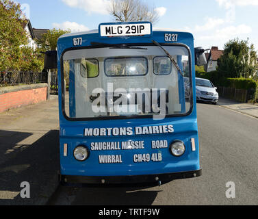 An original milk float still in use in Wirral England UK Stock Photo ...