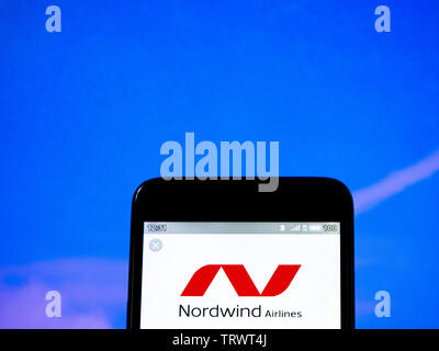 In this photo illustration the Nordwind Airlines logo is seen displayed ...