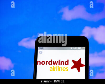 In this photo illustration the Nordwind Airlines logo is seen displayed ...