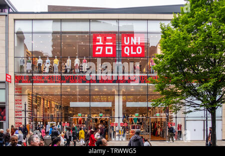 Shoppers walking past the UNIQLO Manchester store, Market Street ...