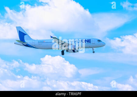 FlyOne Airbus A320 flying over Lviv Airport before landing Stock Photo ...