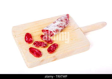 Spanish fuet, a dry sausage typical in Catalonia region, cut in slices ...