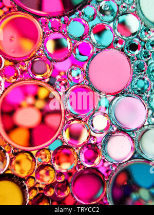 magenta cyan oil bubbles abstract textures Stock Photo - Alamy