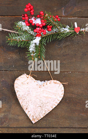 Decorative heart on rope, on wooden background Stock Photo - Alamy