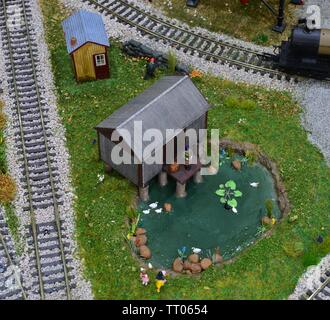 A model pond on a model railway Stock Photo - Alamy