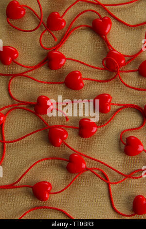 Texture of a beautiful golden festive chain unique weaving in the shape ...