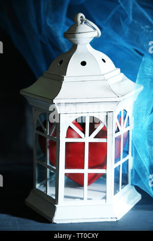 Heart in cage on dark background Stock Photo - Alamy