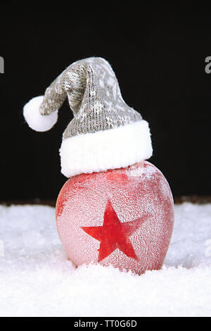 Holiday apple with frosted star on wooden background Stock Photo - Alamy