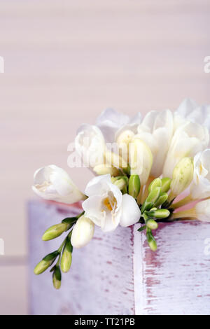 Beautiful freesias in wooden box Stock Photo - Alamy