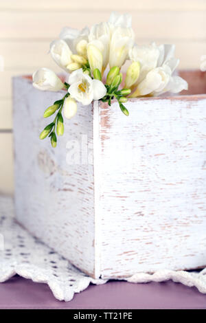 Beautiful freesias in wooden box Stock Photo - Alamy