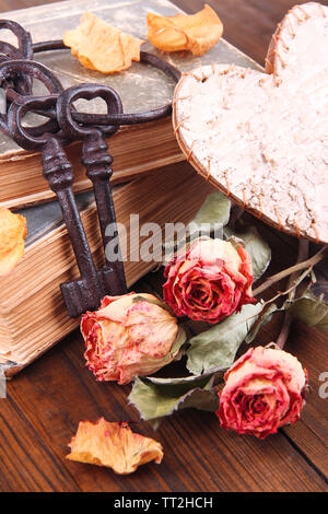 Antique key and beautiful buds of roses on a white background Stock ...