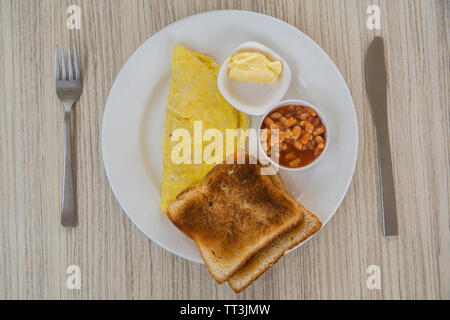 healthy breakfast plate with omelette grilled paneer and fresh cucumber ...