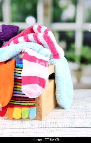 Donation box with donation clothes on a wooden table Stock Photo - Alamy