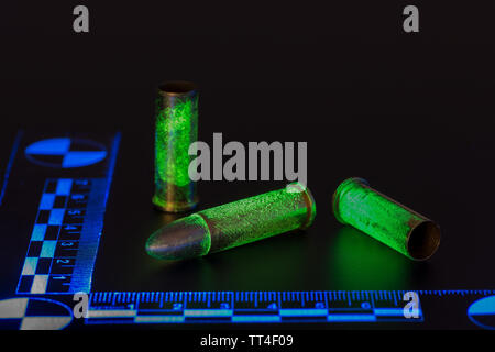 Empty Bullet Casing at a Crime Scene Marked by Forensics as Part of an ...