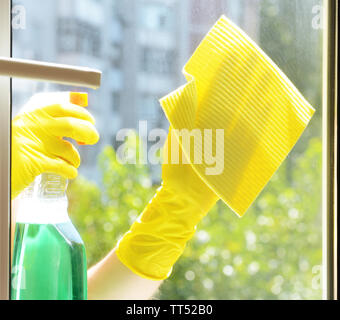 Cleaning windows with special rag and cleaner. spring cleaning Stock ...