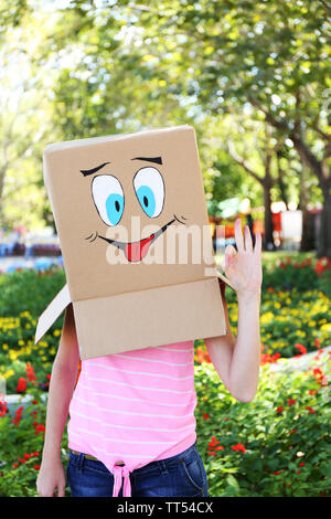 Woman with face pack smiling Stock Photo - Alamy