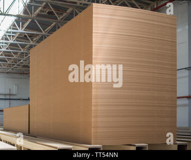 Big stack of MDF boards. Medium Density Fibreboard. Selective focus ...