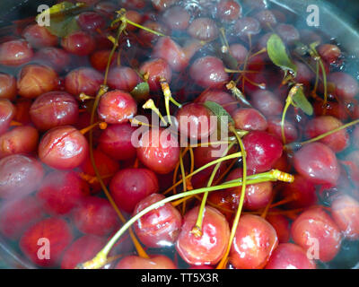 cherry composting boiling harvest festival Stock Photo - Alamy
