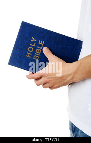 Man holding Bible isolated on white Stock Photo - Alamy
