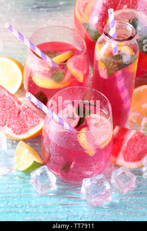 Pink lemonade in glasses and pitcher isolated on white Stock Photo - Alamy