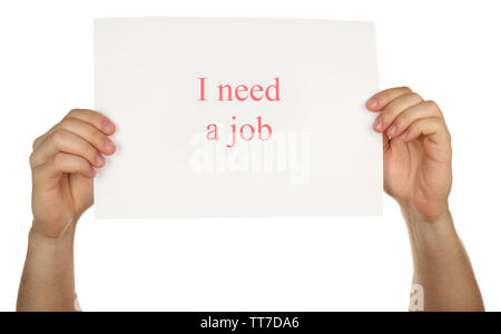 Sheet of paper with inscription I need a job in male hands on dark ...