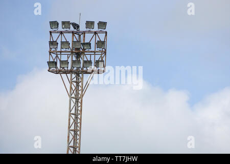 Big spotlights lighting tower at an sport arena stadium Stock Photo - Alamy