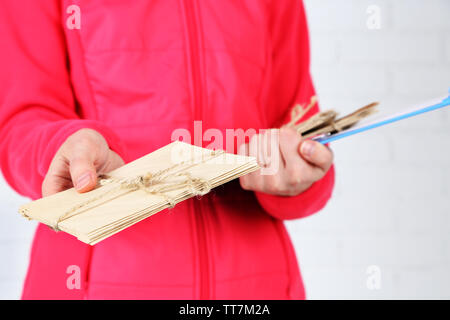 Courier with letters close-up Stock Photo - Alamy