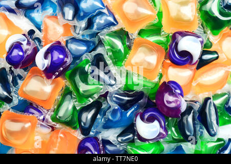 Gel capsules with laundry detergent close up Stock Photo - Alamy