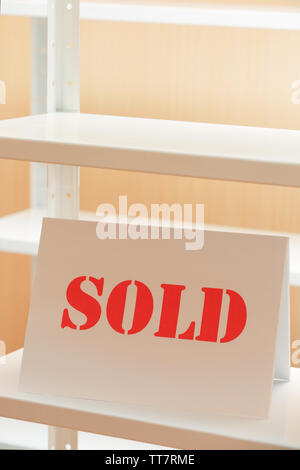 Blank with text sold on light background Stock Photo - Alamy