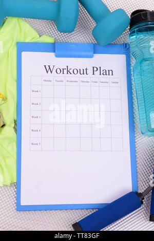 Workout plan and sports equipment top view close-up Stock Photo - Alamy