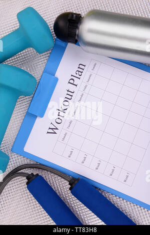 Workout plan and sports equipment top view close-up Stock Photo - Alamy