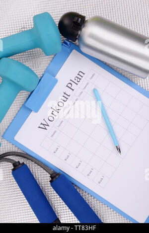 Workout plan and sports equipment top view close-up Stock Photo - Alamy