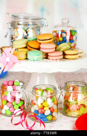 Prepared birthday table with sweets for children party Stock Photo - Alamy