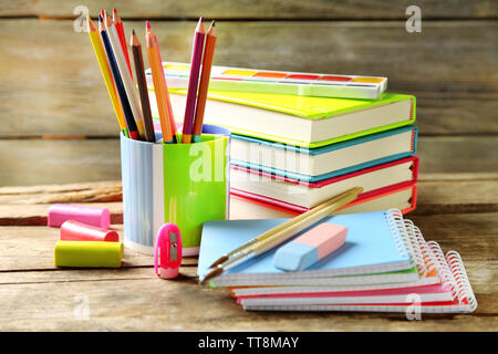 Bright school stationery on old wooden table Stock Photo - Alamy
