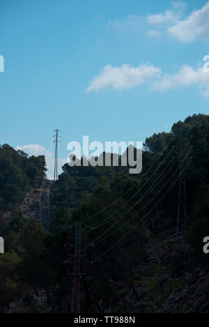 power lines cutting through forest in grazalema, andalusia, spain Stock ...