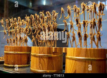 Deep fried and on a stick, scorpions, silkworms, beatles, crickets ...