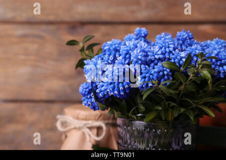 Blue bell flowers and flowers on wooden background Stock Photo - Alamy