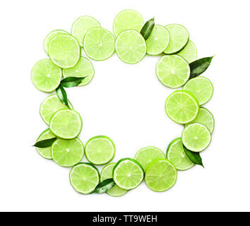 Round frame with limes, slices, leaves, and flowers, hand painted in ...