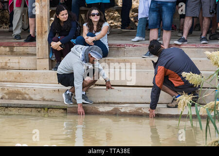 BETHABARA, ISRAEL- 25 NOVEMBER 2017: Pilgrims from different countries ...