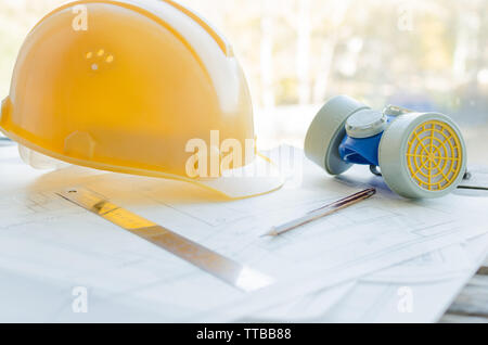 Engineering workplace, drawings, protective construction helmet and ...