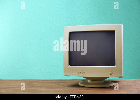 Obsolete computer set on light blue background Stock Photo - Alamy