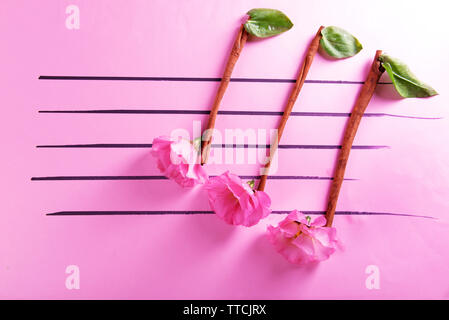 Creative music notes made of flowers on wooden background Stock Photo ...