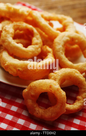 Chips rings on plate closeup Stock Photo - Alamy