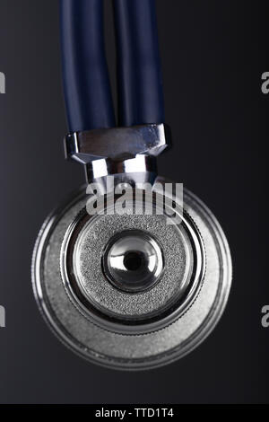 Stethoscope close-up on dark background Stock Photo - Alamy