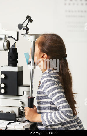 Small girl visit an optician Stock Photo - Alamy