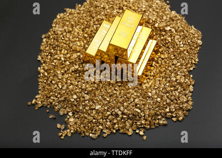 gold bars on grey background Stock Photo - Alamy