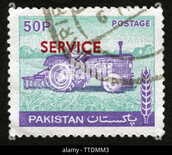 Stamp print in Pakistan,Agriculture,tractor Stock Photo - Alamy