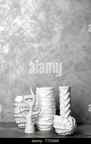 Home decor on grey wall background Stock Photo - Alamy