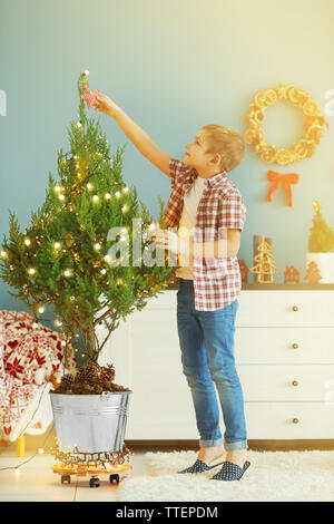Beautiful Christmas tree decorated with blue and silver toys. New Years ...